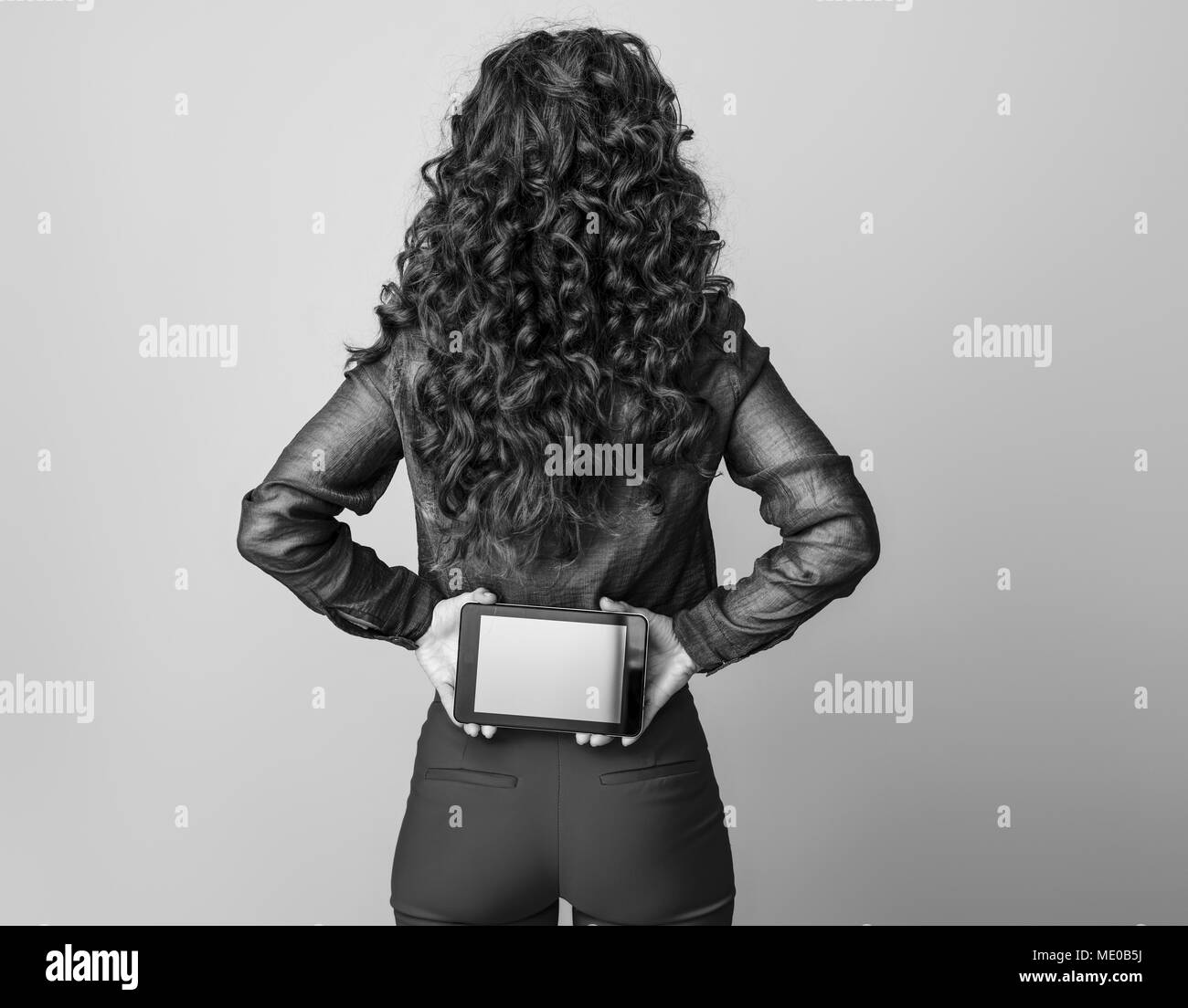 Female on computer from behind Black and White Stock Photos & Images ...