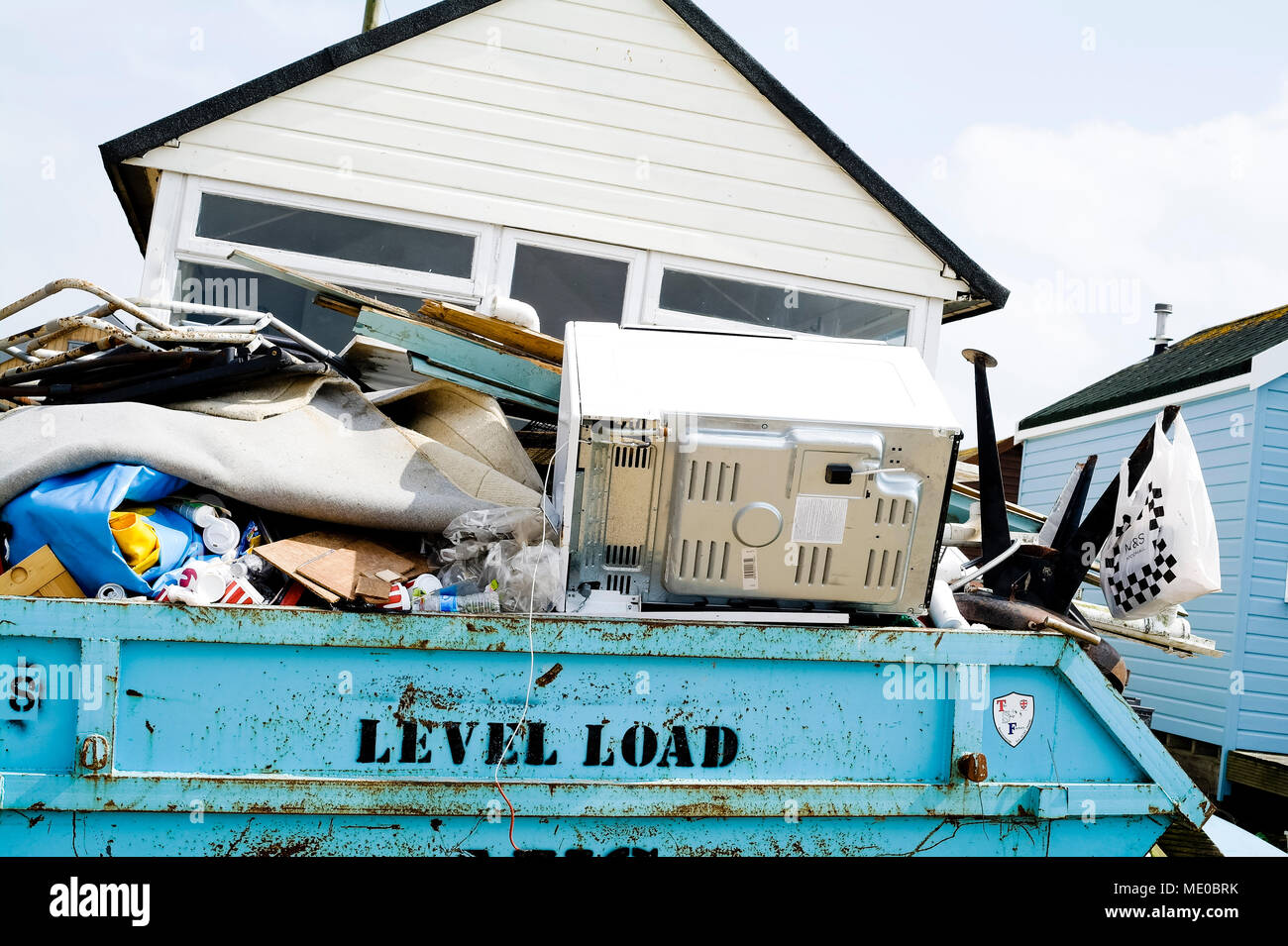 Overflowing skip hi-res stock photography and images - Alamy