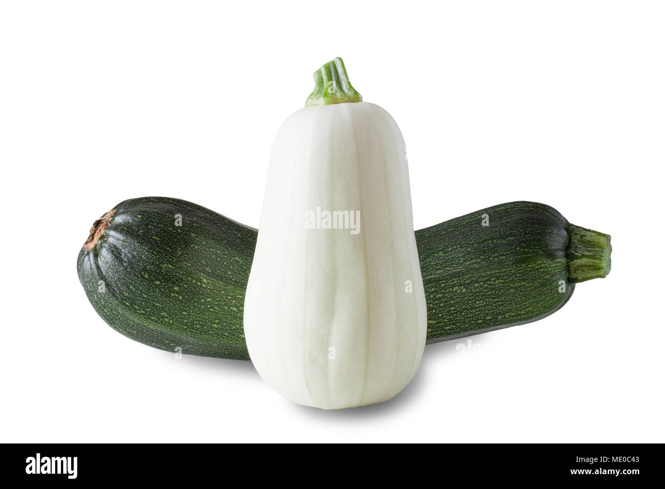 Two zucchini isolated on white background. Clipping path Stock Photo ...
