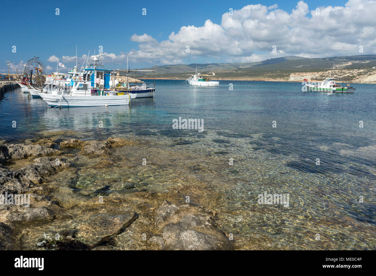 Boats in Agios Georgios harbour in the spring sunshine, Paphos district ...
