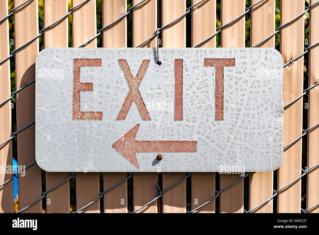 Exit sign with left arrow Stock Photo - Alamy