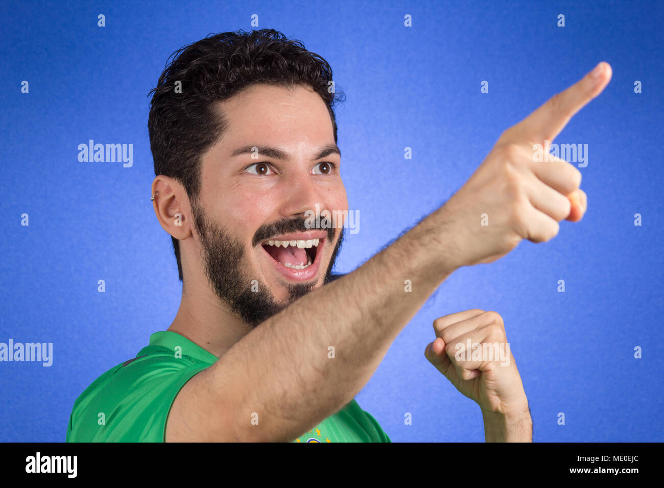 Brazilian soccer football athlete. One supporter and fan celebrating on ...