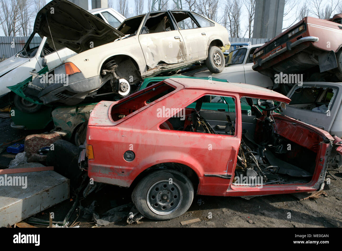 Crushed cars in junkyard Stock Photo - Alamy