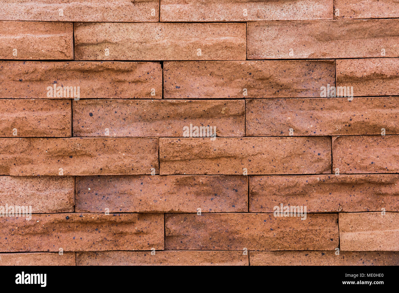 Background of natural red decorative stone tiles, marble brick wall ...
