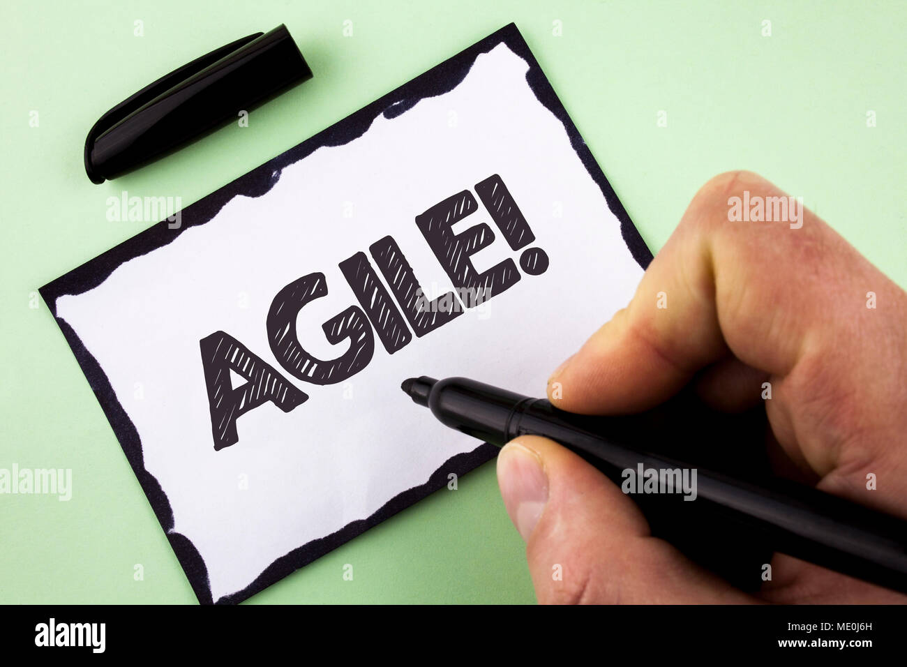 Handwriting text Agile Motivational Call. Concept meaning Develop an ...