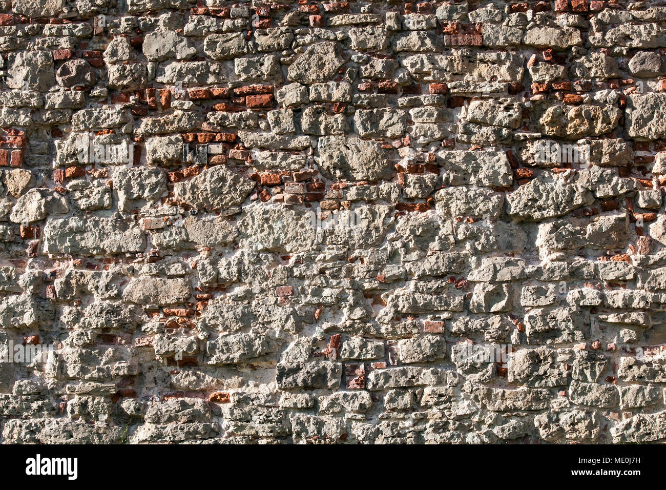Cracked red brick wall, blocks in a line background Stock Photo - Alamy