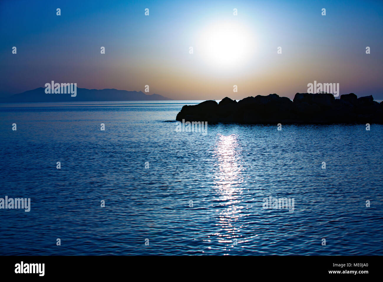 Calm sea water sunrise hi-res stock photography and images - Alamy