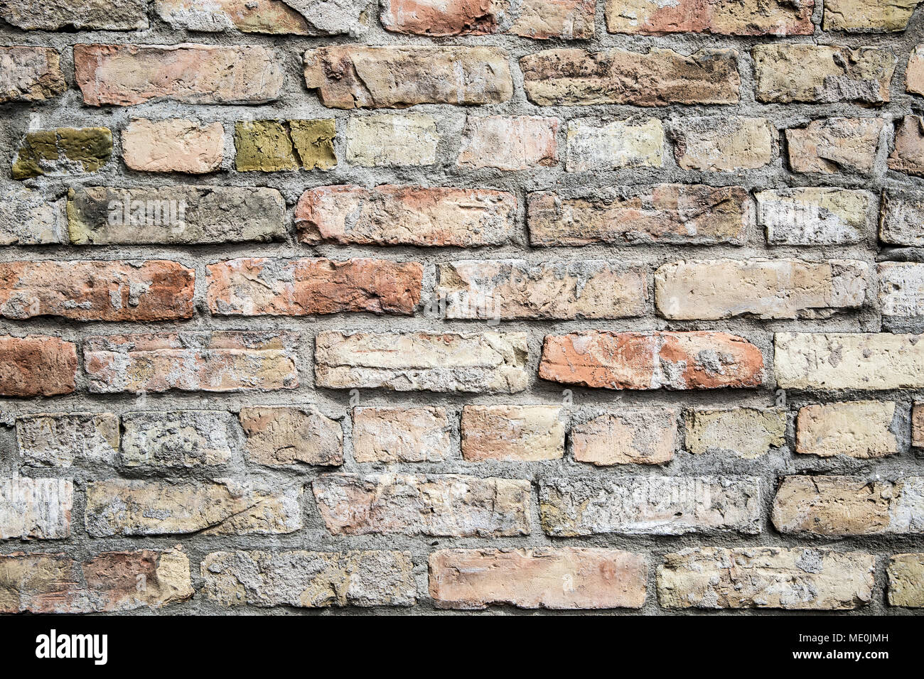 Cracked gray brick wall, blocks in a line background Stock Photo - Alamy