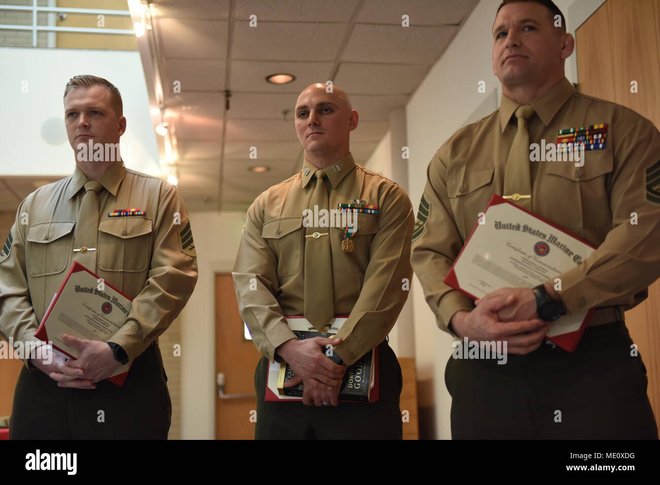 Sgt. Matthew Harrison, far left, Capt. Kyle Tucker-Davis and GySgt ...