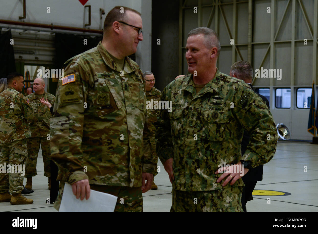 U.S. Navy Fleet Master Chief Crispian Addington, right, senior enlisted ...