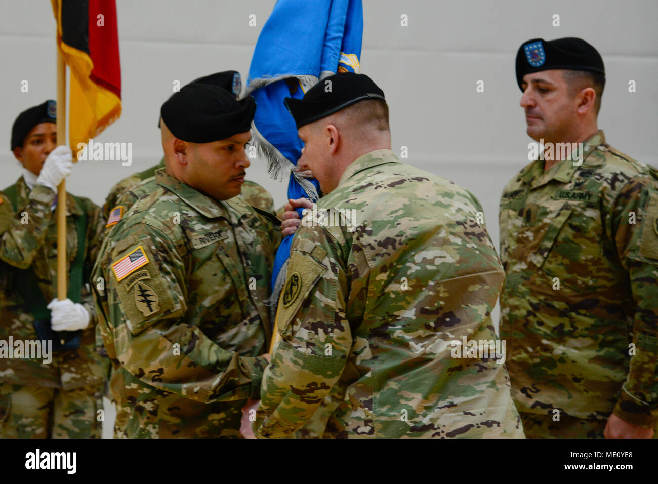 U.S. Army Command Sgt. Maj. Humberto Rivera, left, the outgoing Command ...