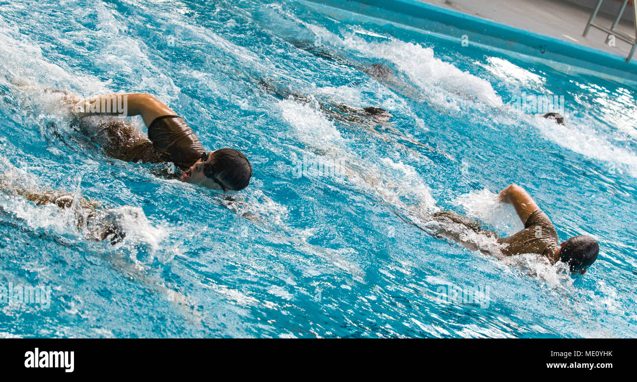U.S. Marines practice proper stroke techniques during a Water Survival ...
