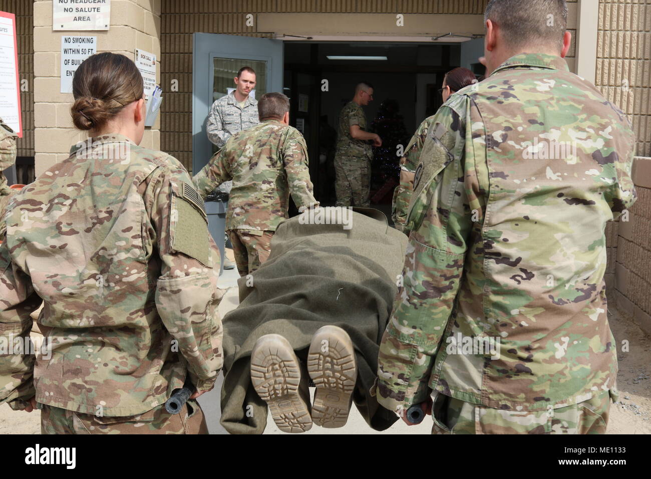 171205-A-RW053-050 Soldiers from the 86th Combat Support Hospital bring ...
