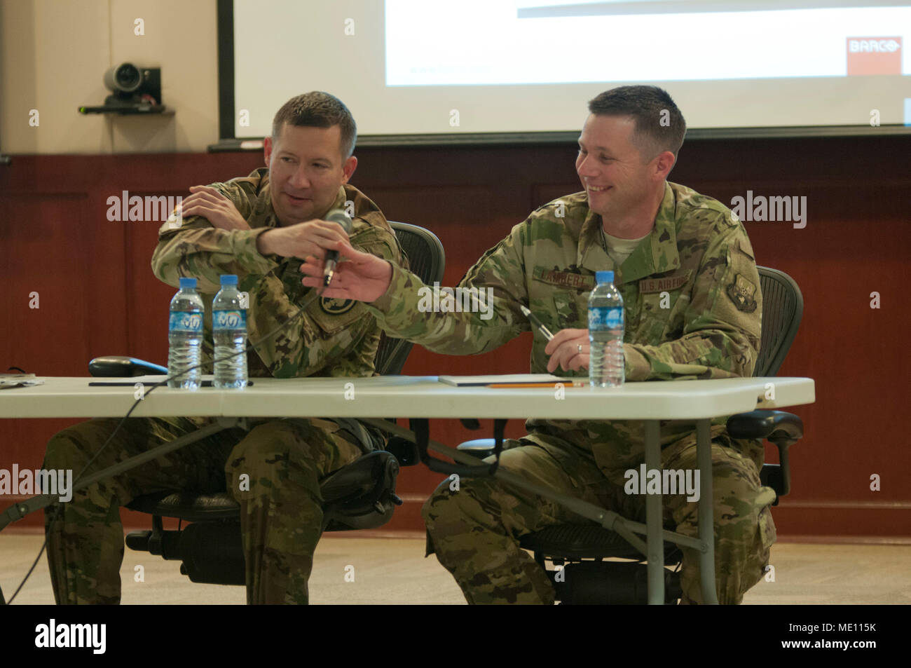 Lieutenant Col. David Vandevender receives the microphone from Maj ...