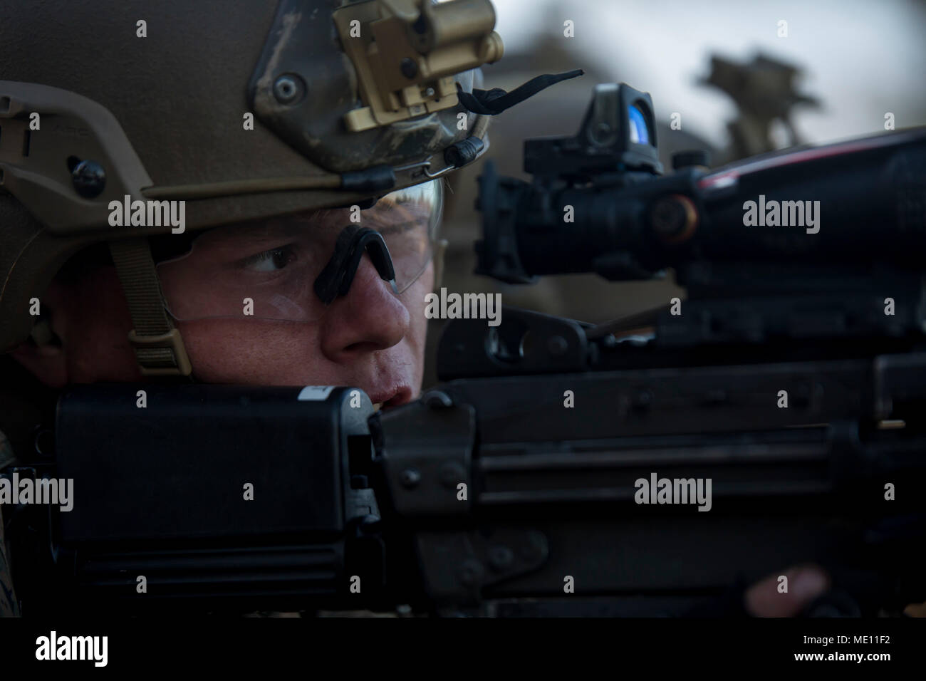 A Marine with 2nd Reconnaissance Battalion focuses downrange through ...