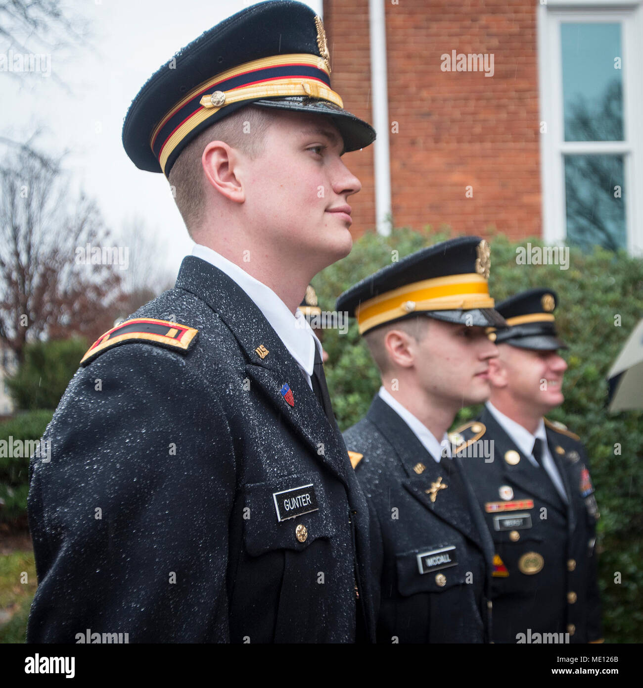 Brand new 2nd Lt. Robert Gunter watches as other new second lieutenants ...