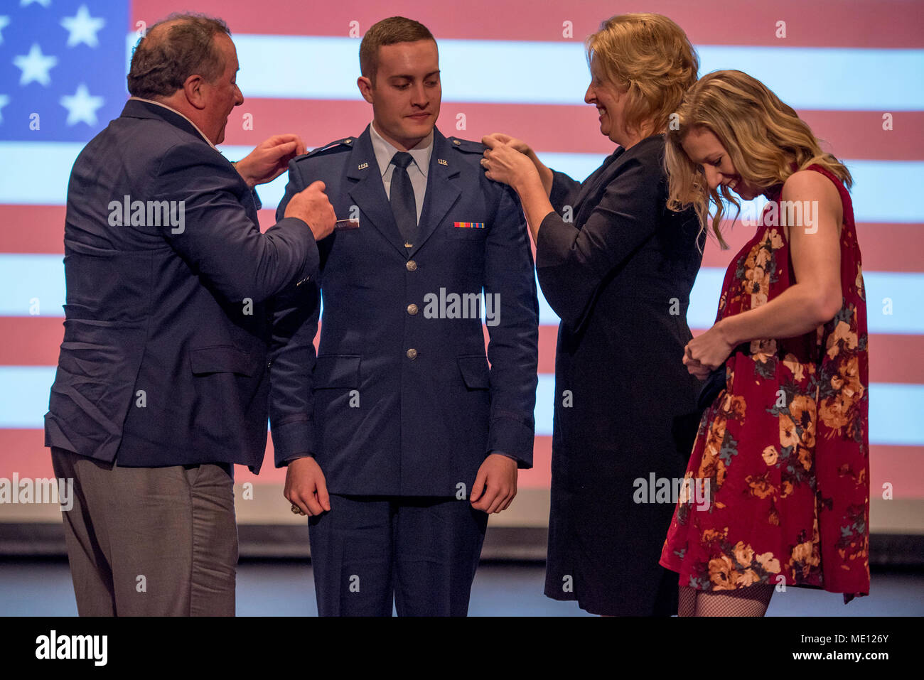 U.S. Air Force 2nd Lt. Christopher Wright’s family pins his rank onto ...