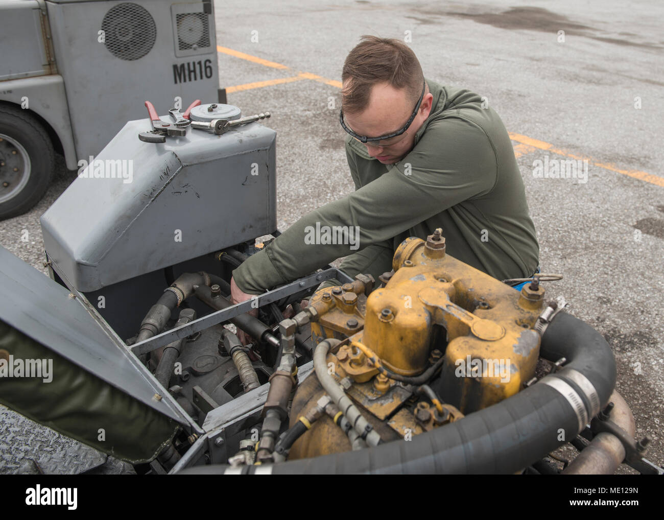 U.S. Air Force Senior Airman John Holland, 18th Equipment Maintenance ...