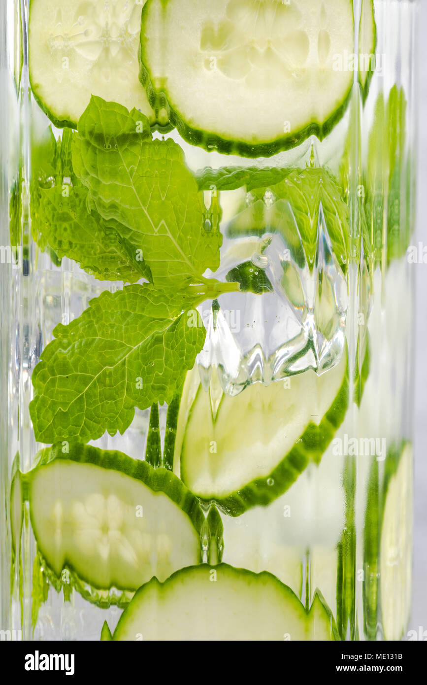 Glass pitcher with mint and cucumber soda. Close up view Stock Photo ...