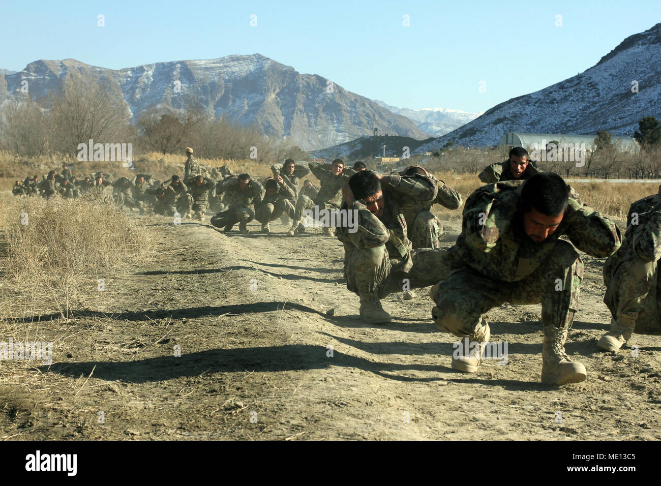 Afghan soldiers conduct a 300-meter duck walk during the 22nd Commando ...