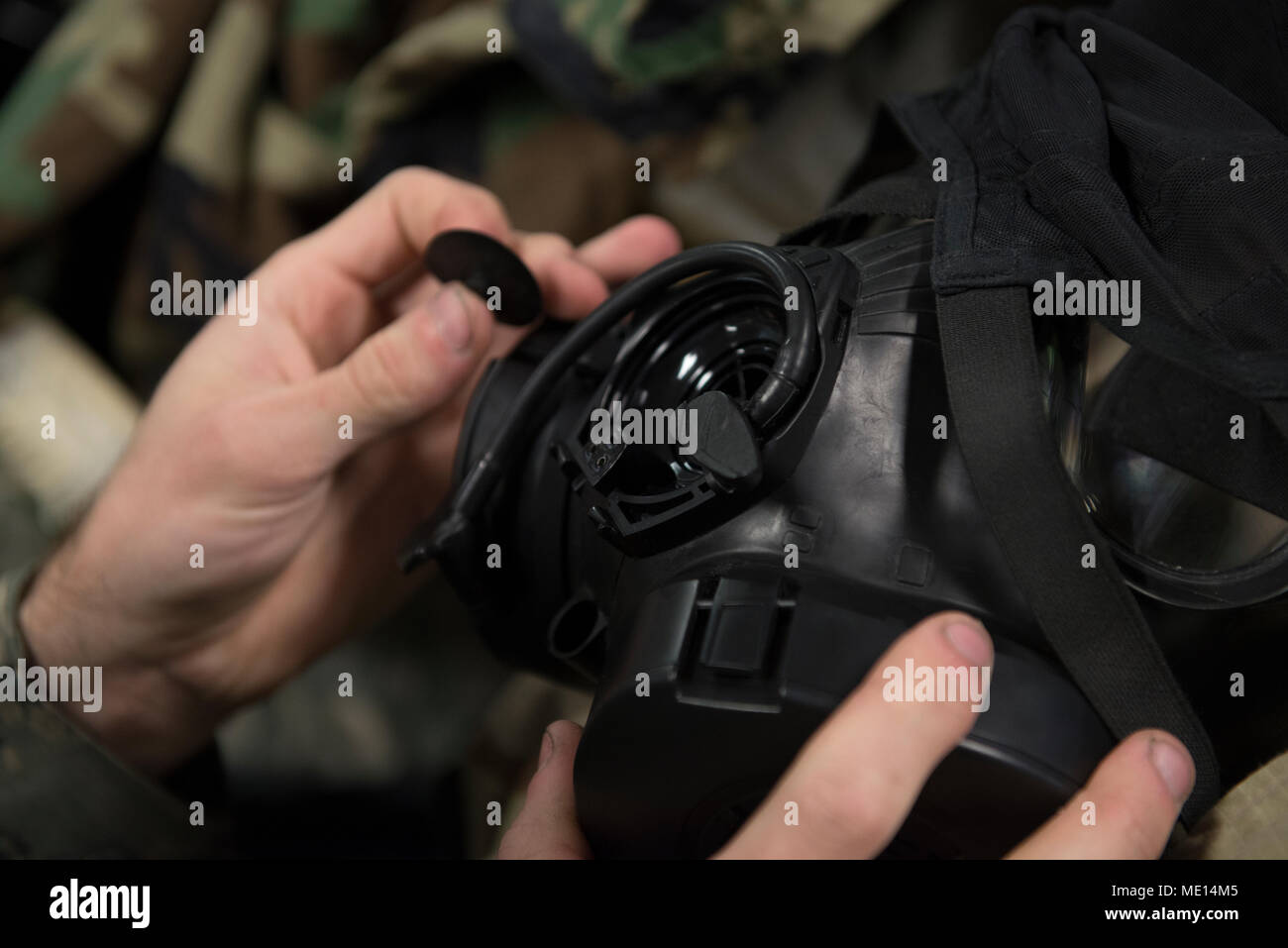 A 366th Fighter Wing Airman checks the inlet/outlet disk valve on his ...