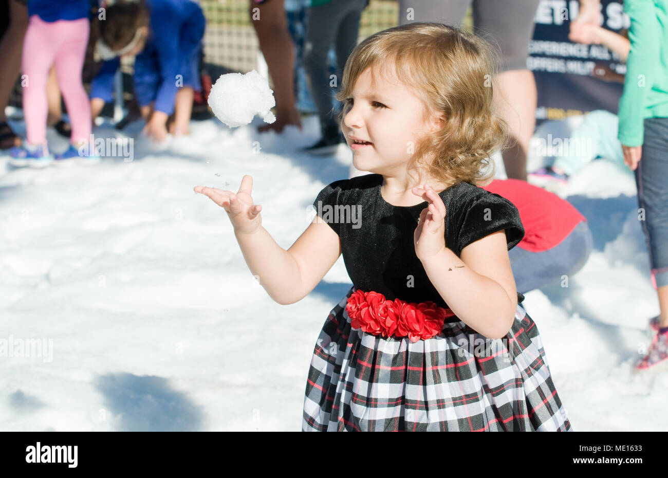 ALIAMANU MILITARY RESERVATION — Stella Goodman plays with man-made snow ...