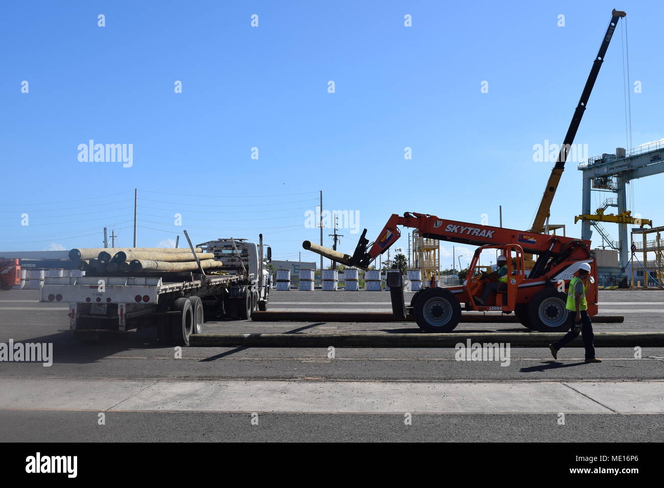 PONCE, PUERTO RICO (Dec. 22, 2017) – Pressure-treated wooden utility ...