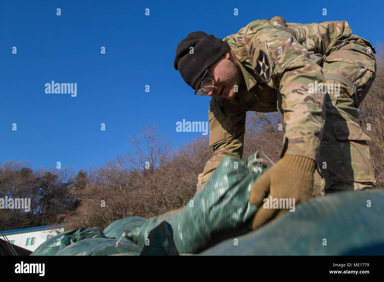 U.S. Army Soldier with B Battery, 1st Battalion, 38th Field Artillery ...