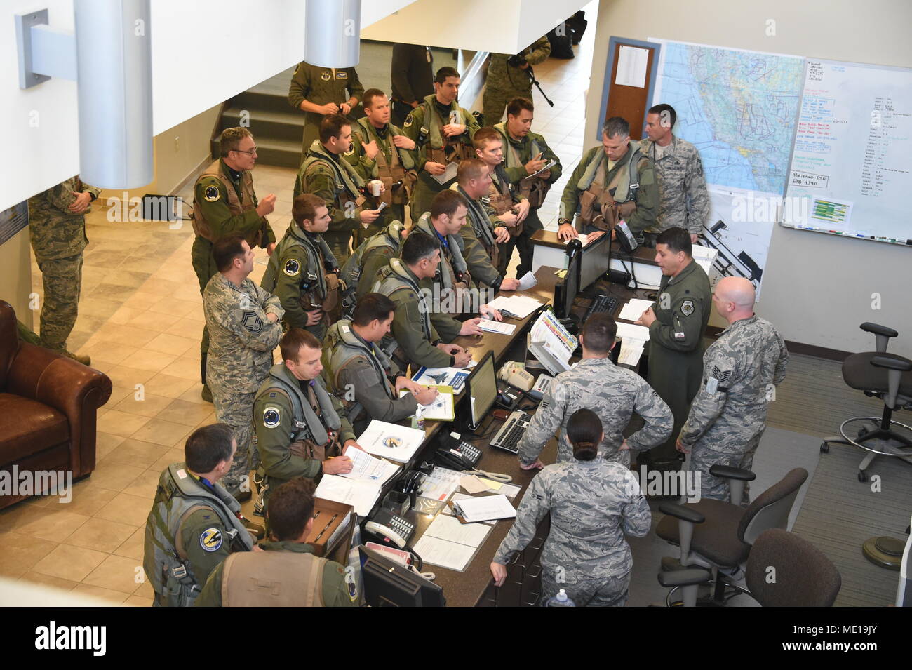 194th Fighter Squadron pilots from the 144th Fighter Wing recieve a ...