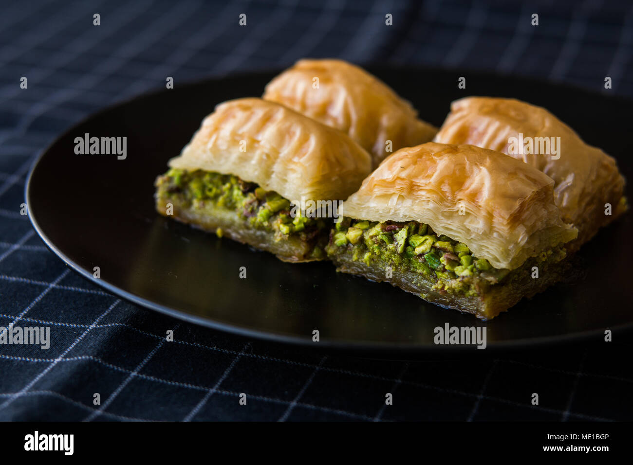 Baklava is a rich, sweet pastry made of layers of filo filled with ...