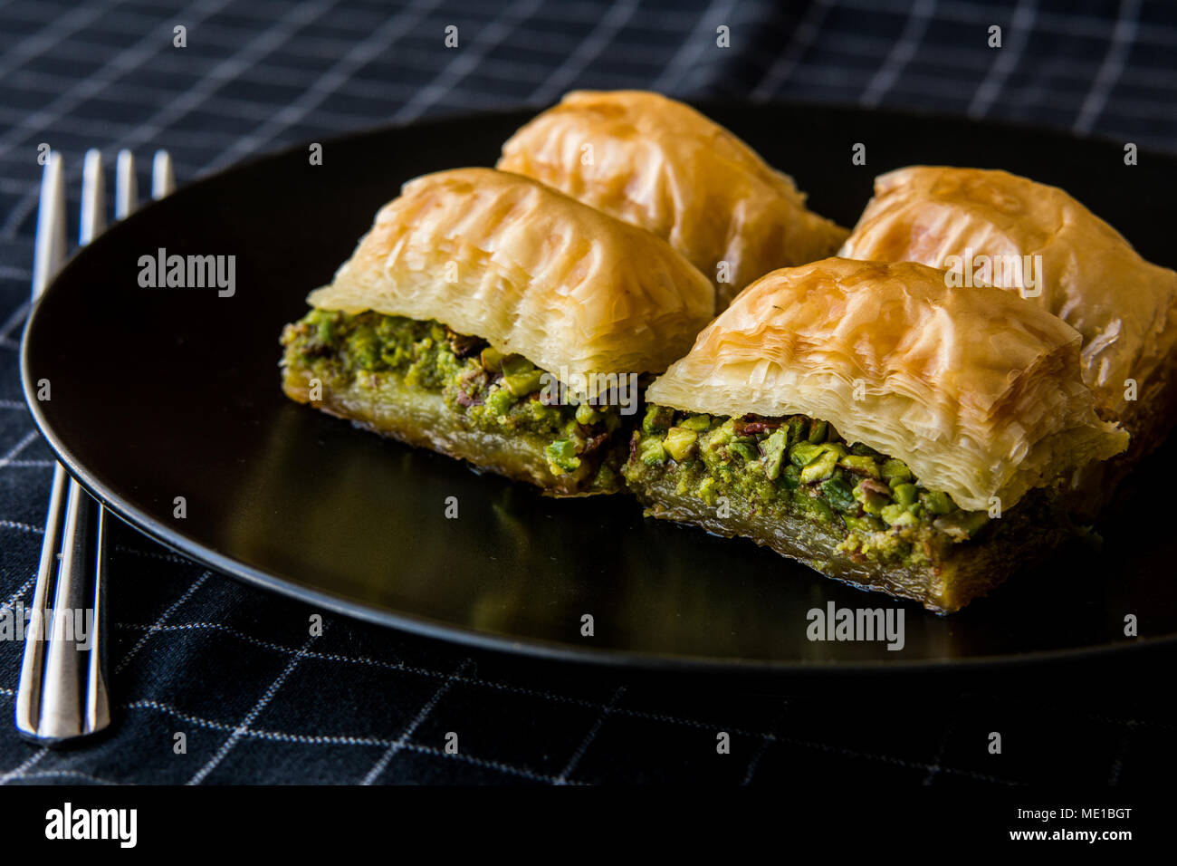 Baklava is a rich, sweet pastry made of layers of filo filled with ...