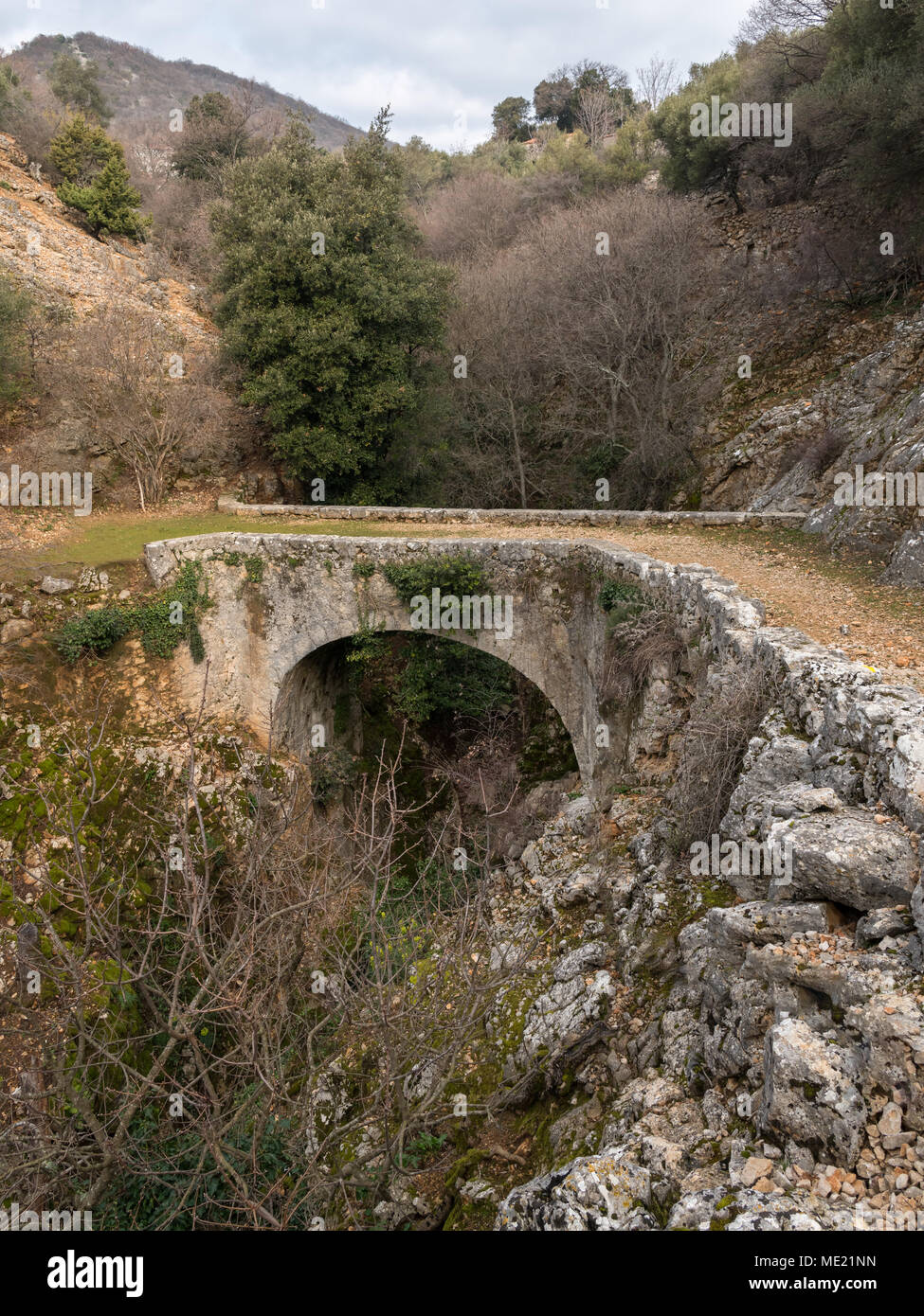 The old ancient roman bridge in Beli (Island Cres, Croatia) on a cloudy ...