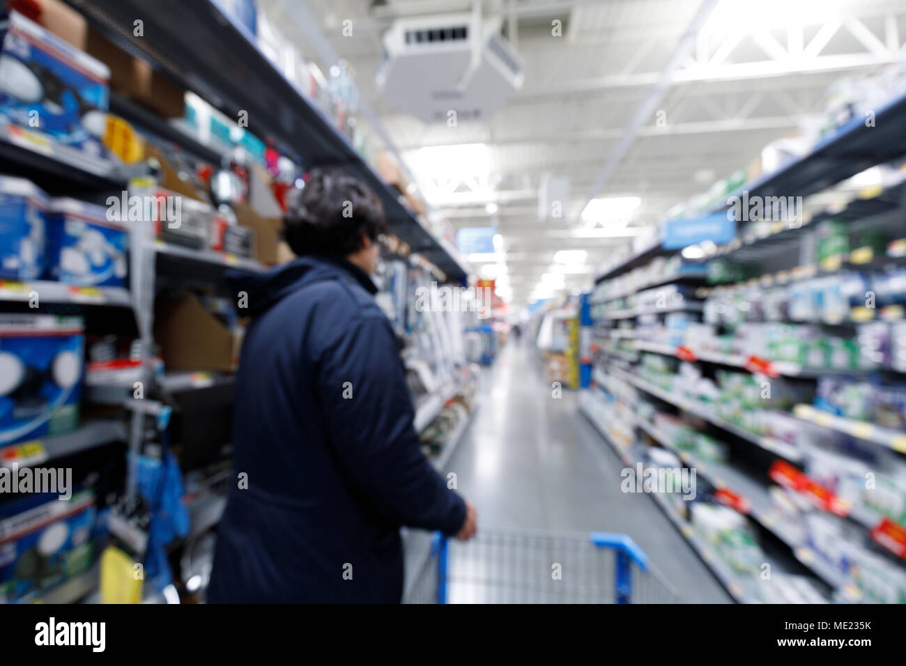 Blurred mart shop store background with customer shopping interior ...