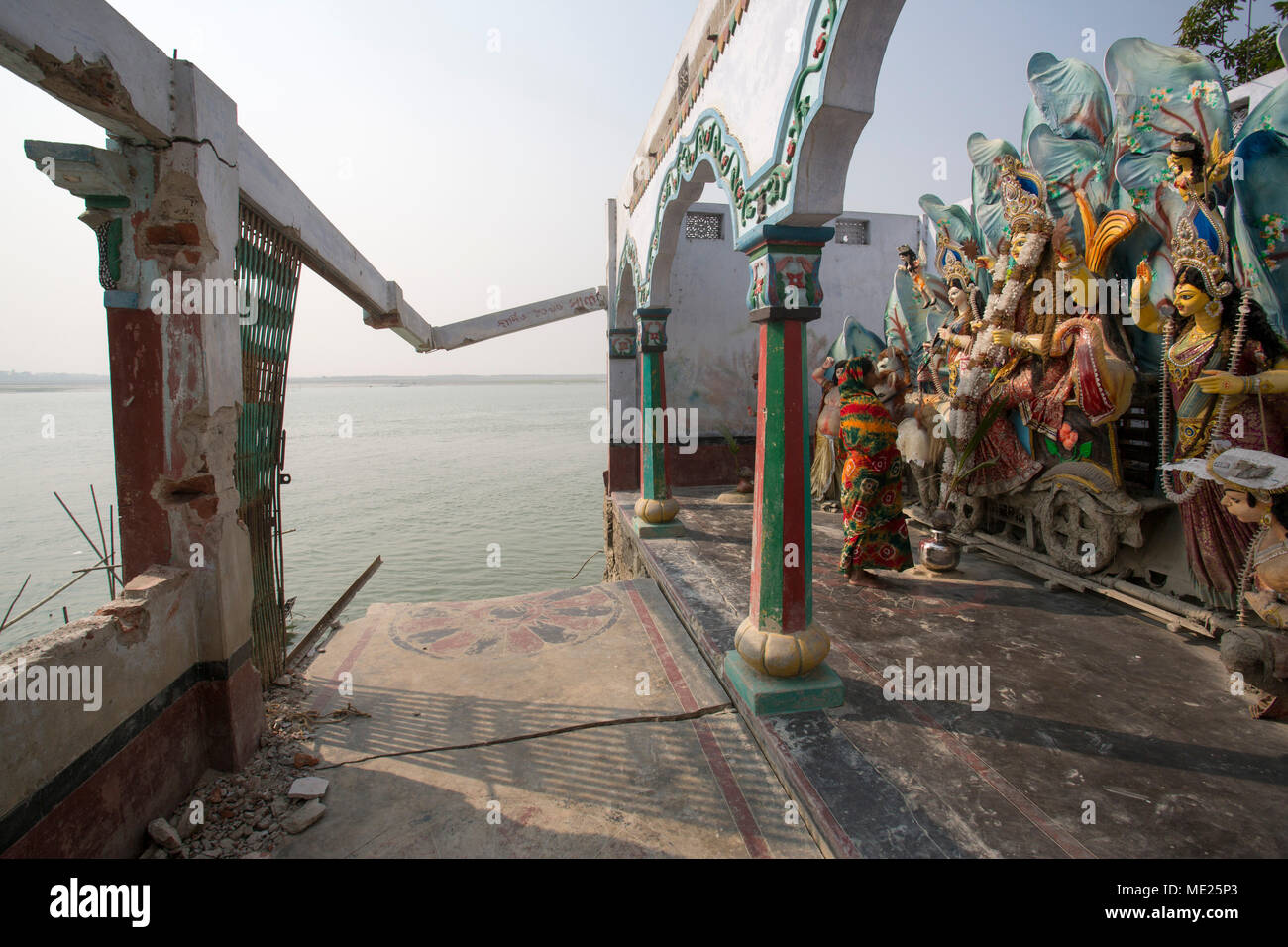MUNSHIGONJ, BANGLADESH - JANUARY 24 : A hindu devotee's temple going ...