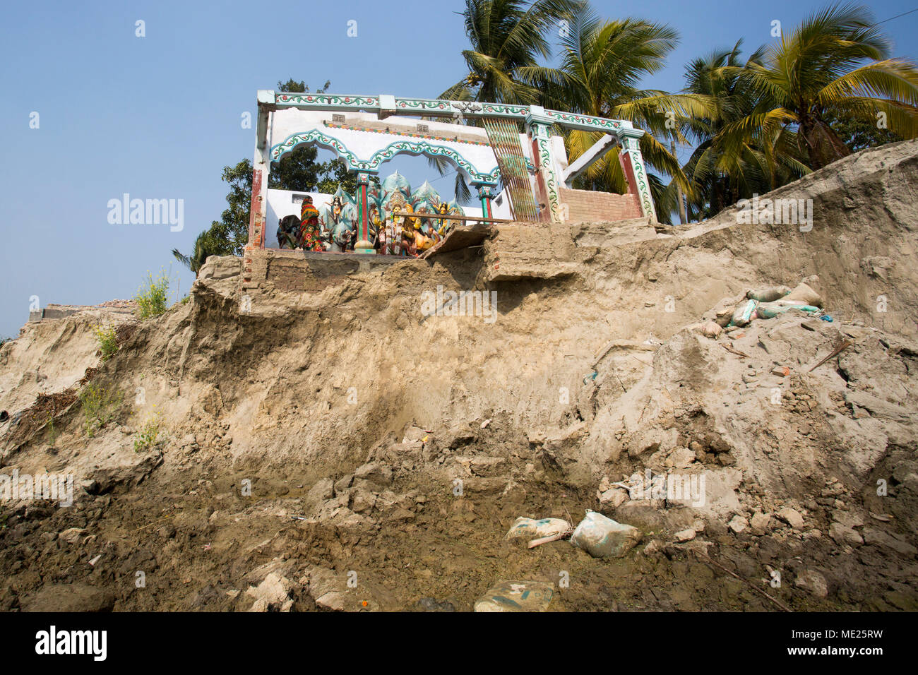 MUNSHIGONJ, BANGLADESH - JANUARY 24 : A hindu devotee's temple going ...