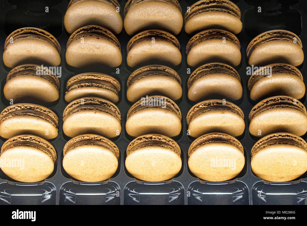 Stack of French chocolate macaroons cookies Stock Photo - Alamy