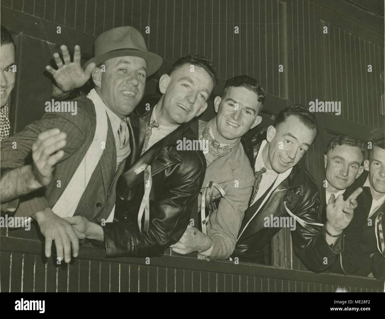 Soccer team members wave goodbye from the train, Brisbane Stock Photo ...