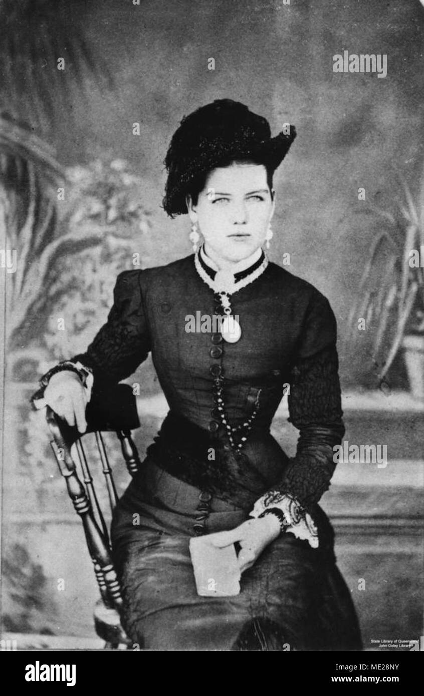 Studio portrait of Elizabeth Plane seated in a chair at Stock Photo - Alamy