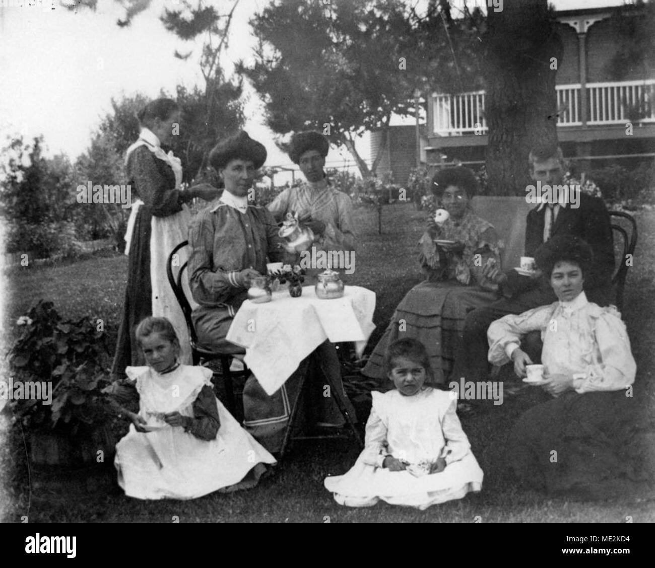 Mrs Henrietta Harriet Johnstone pouring tea at her home, Mountain Stock ...