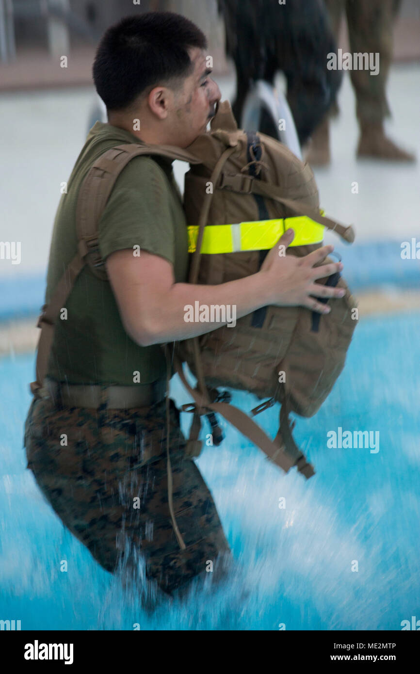 A Marine with Alpha Company, Battalion Landing Team, 1st Battalion, 1st ...