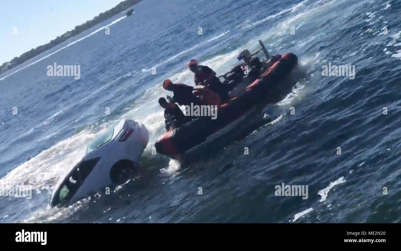 Coast Guard members from Coast Guard Cutter Marlin rescue an 89-year ...