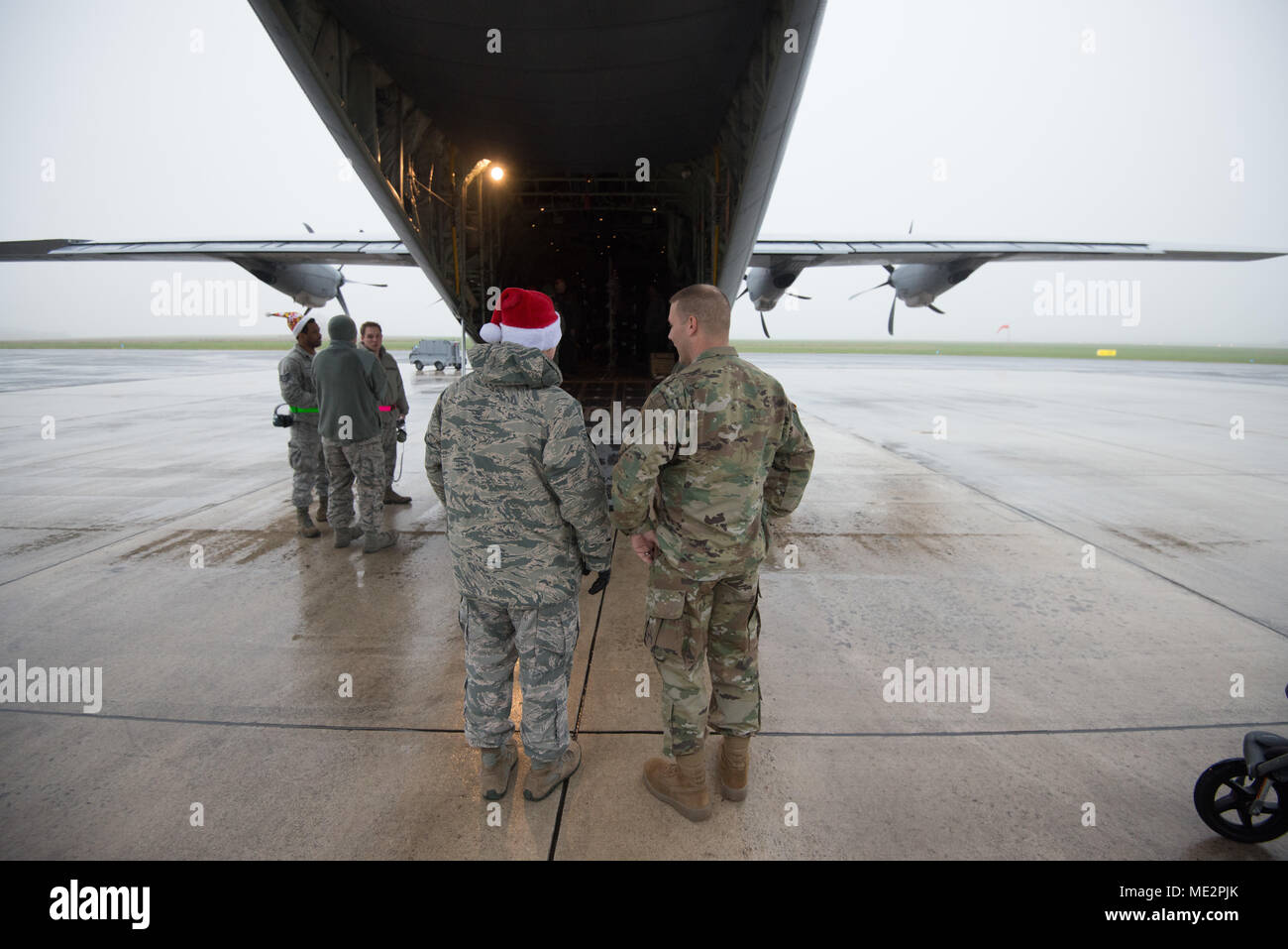 Families of U.S. Airmen with the 424th Air Base Squadron, and of U.S ...