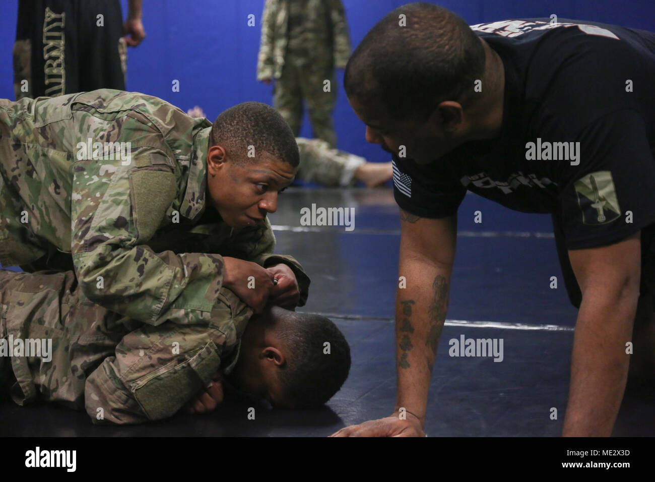 U.S. Army Pv2. Anthony Todd, (top) assigned to the 55th Signal Company ...
