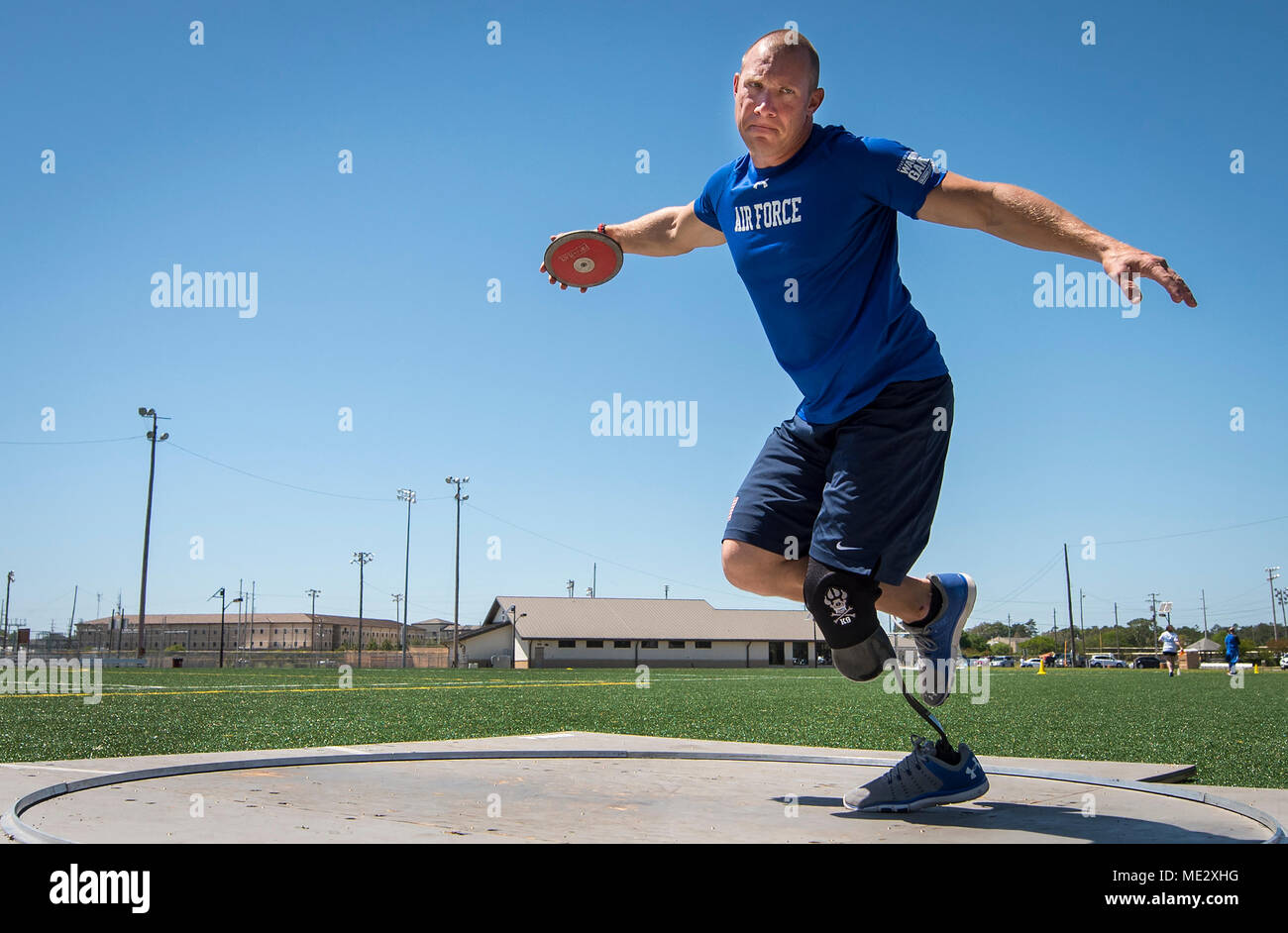 Ben Seekell, a Warrior Games athlete, goes into his discus rotation ...