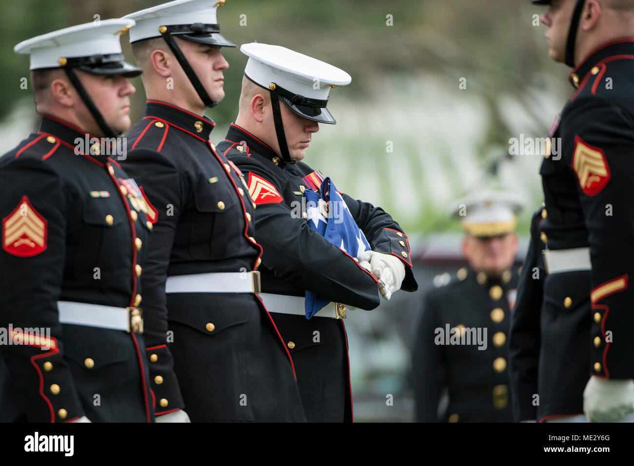 Marines from the Marine Barracks, Washington, D.C. (8th and I) fold the ...