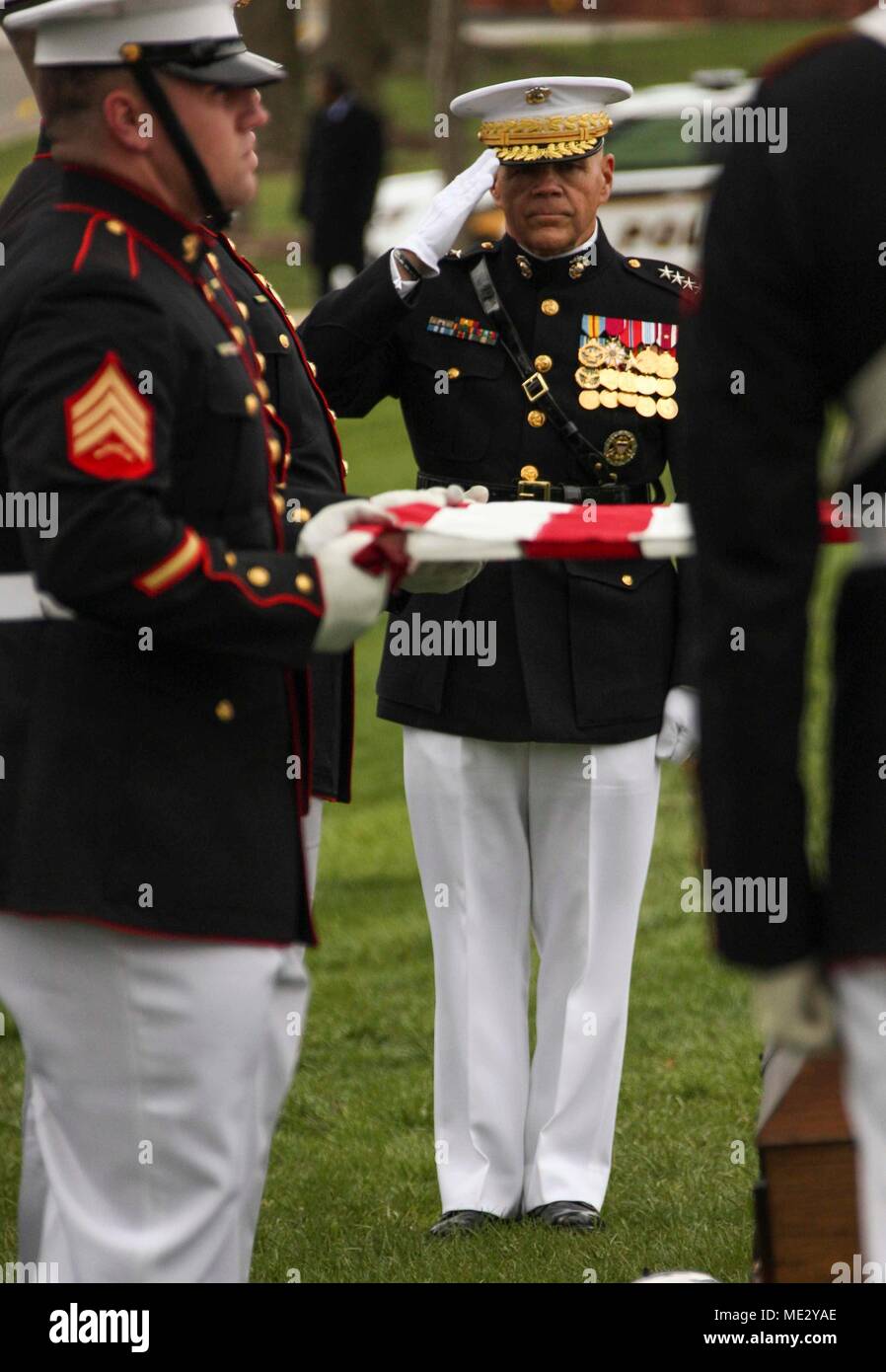 Commandant of the Marine Corps Gen. Robert B. Neller salutes during the ...