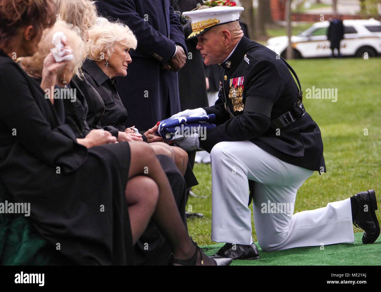 Commandant of the Marine Corps Gen. Robert B. Neller presents an ...