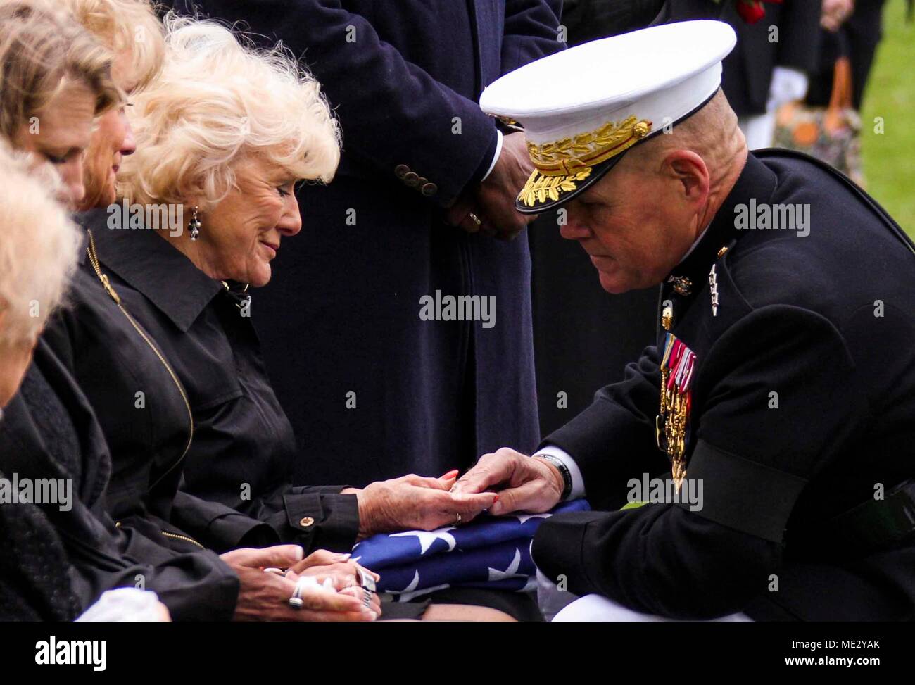 Commandant of the Marine Corps Gen. Robert B. Neller presents an ...