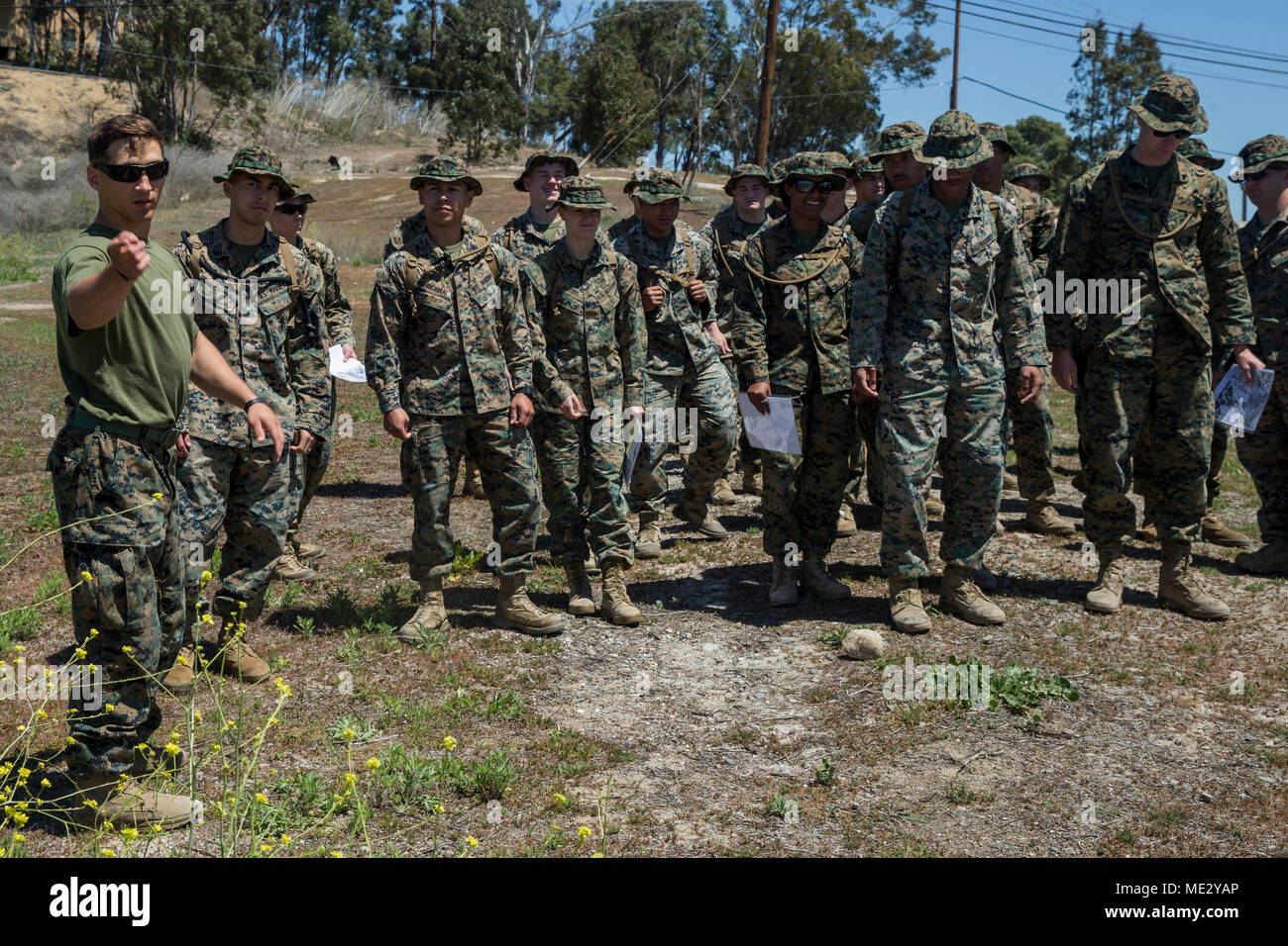 A U.S. Marine Corps land navigation instructor, left, with Headquarters ...