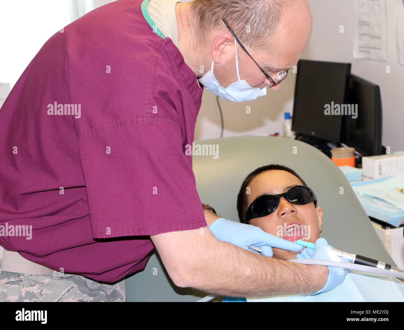 Lt. Col. Gregory Schmidt, a dentist assigned to the 122nd Fighter Wing ...